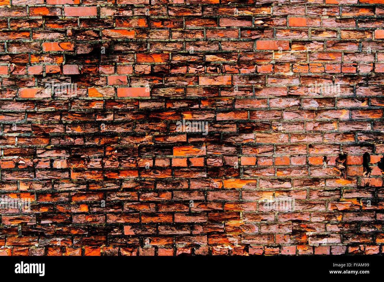 Old deteriorating red brick wall Stock Photo - Alamy