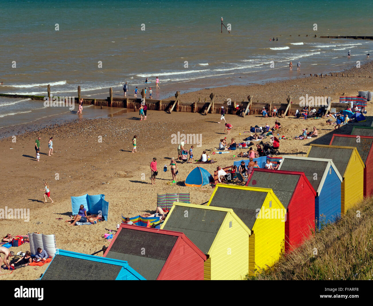 The Golden Sandy Beach and Colourful Beach Huts at Mundesley, Norfolk ...
