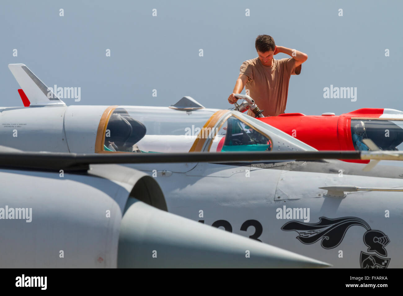 Mechanic refueling jet aircraft hi-res stock photography and images - Alamy