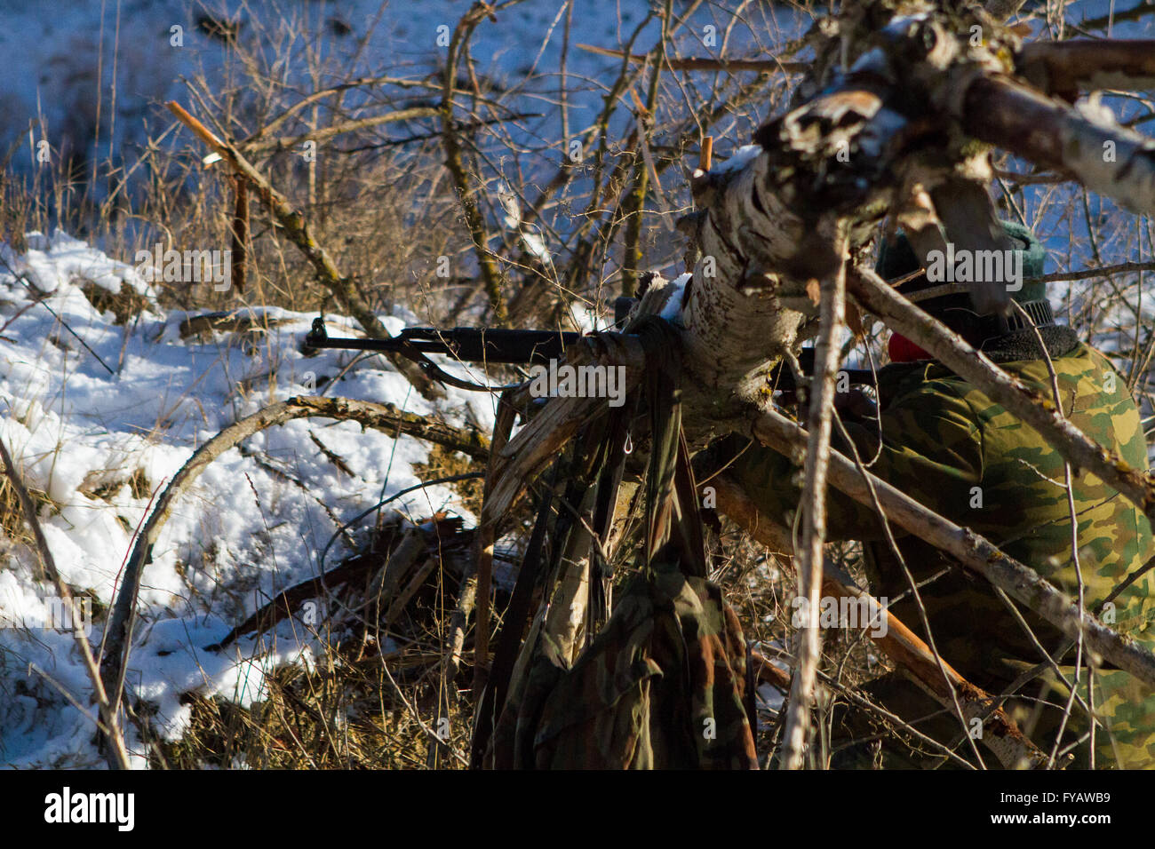 soldier or sniper holding gun with virtual screen projection and aiming ...