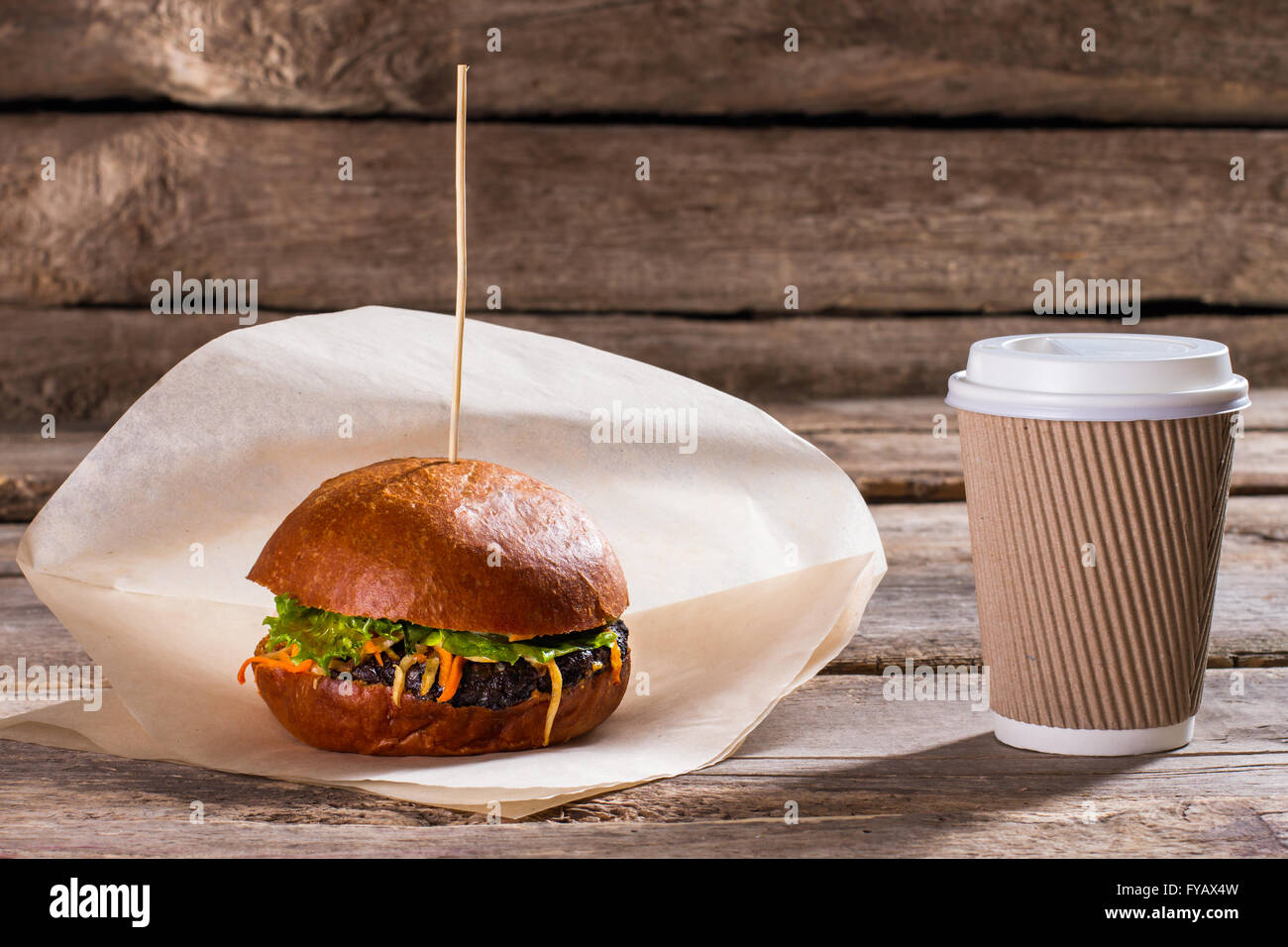 Hamburger and paper coffee cup Stock Photo - Alamy