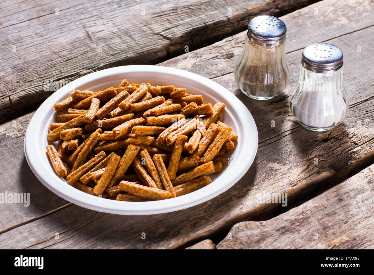 Crackers with salt and pepper Stock Photo - Alamy
