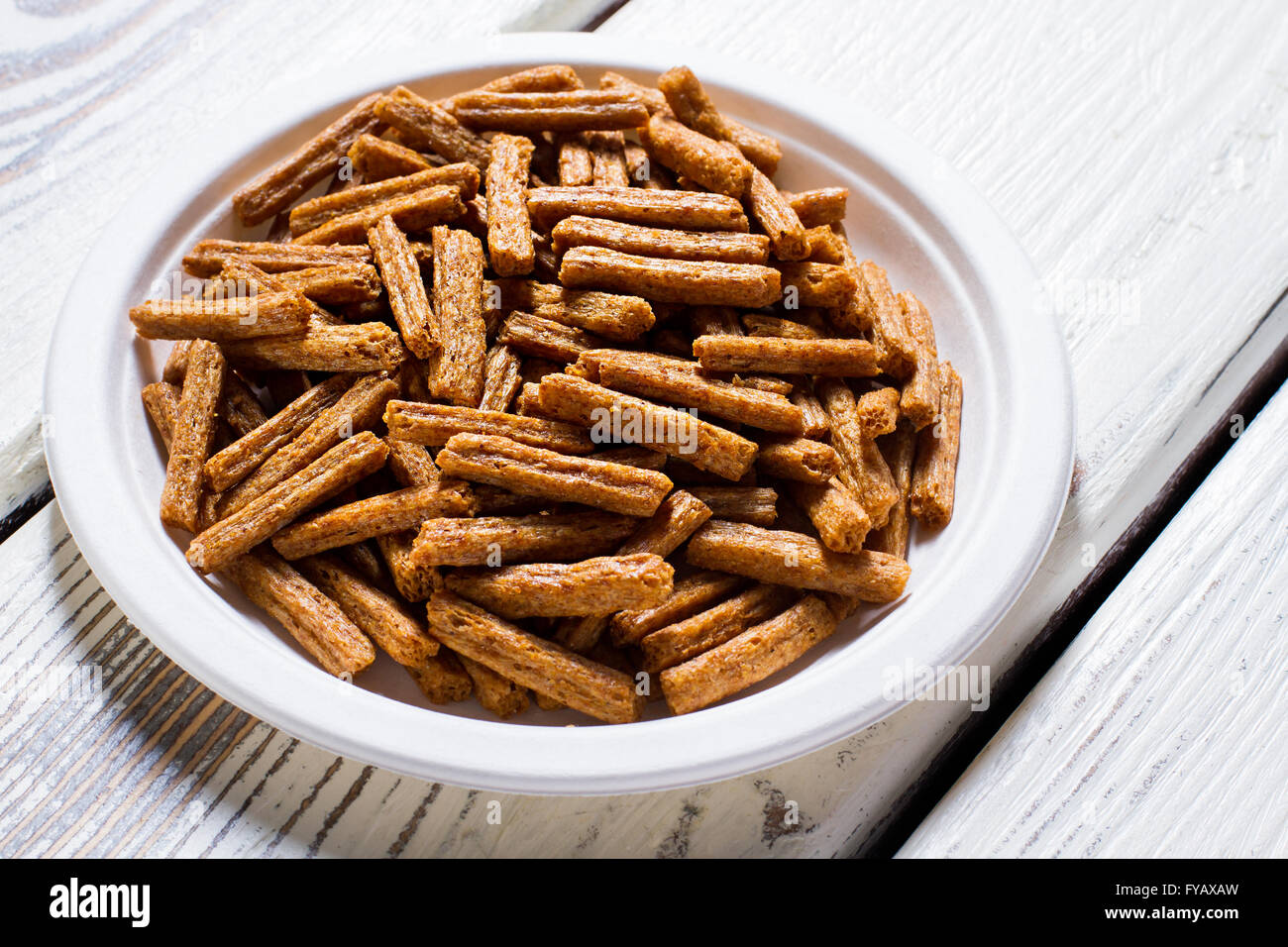 Small crackers on a plate Stock Photo - Alamy