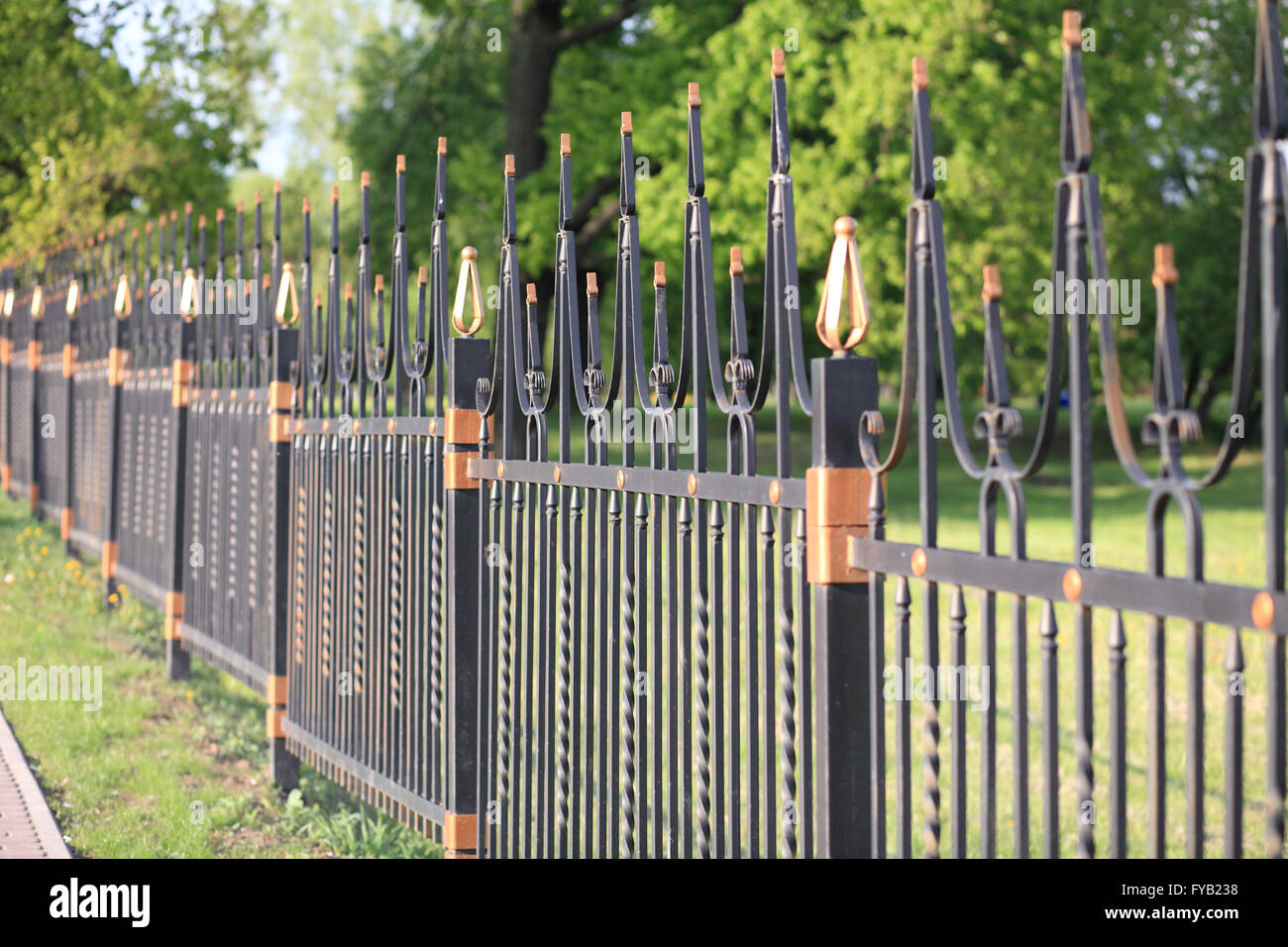 fence with gold decoration Stock Photo - Alamy