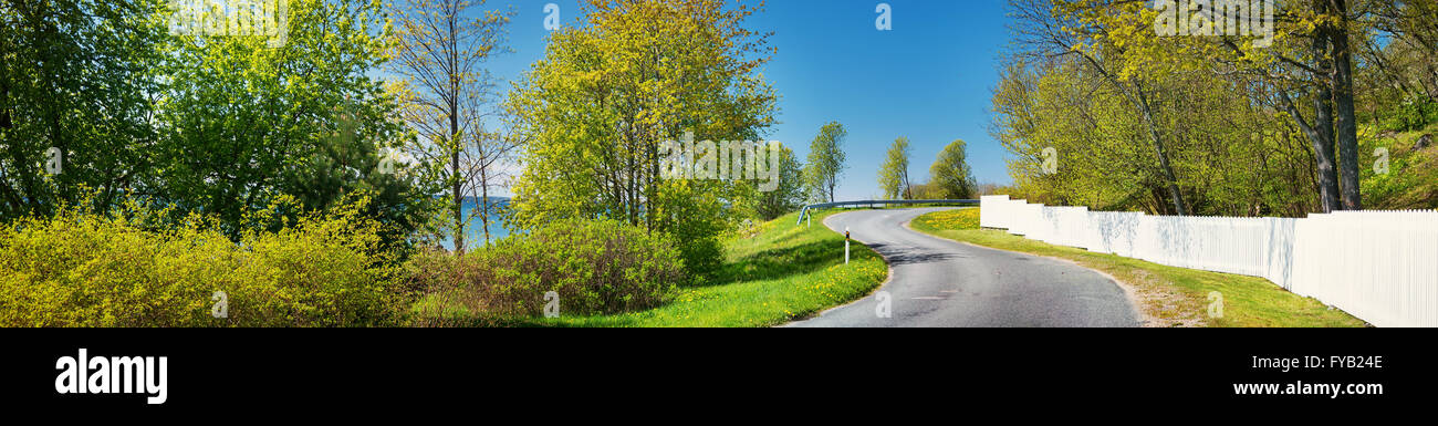 Car on asphalt road in beautiful spring day Stock Photo - Alamy