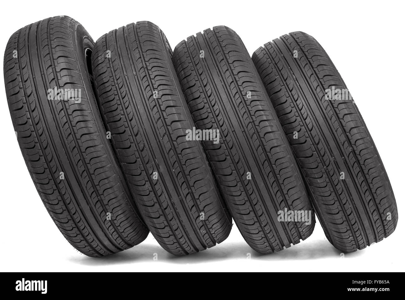 Four black tires Stock Photo - Alamy