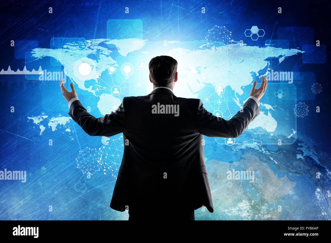 Rear view of businessman looking at digital screen Stock Photo - Alamy