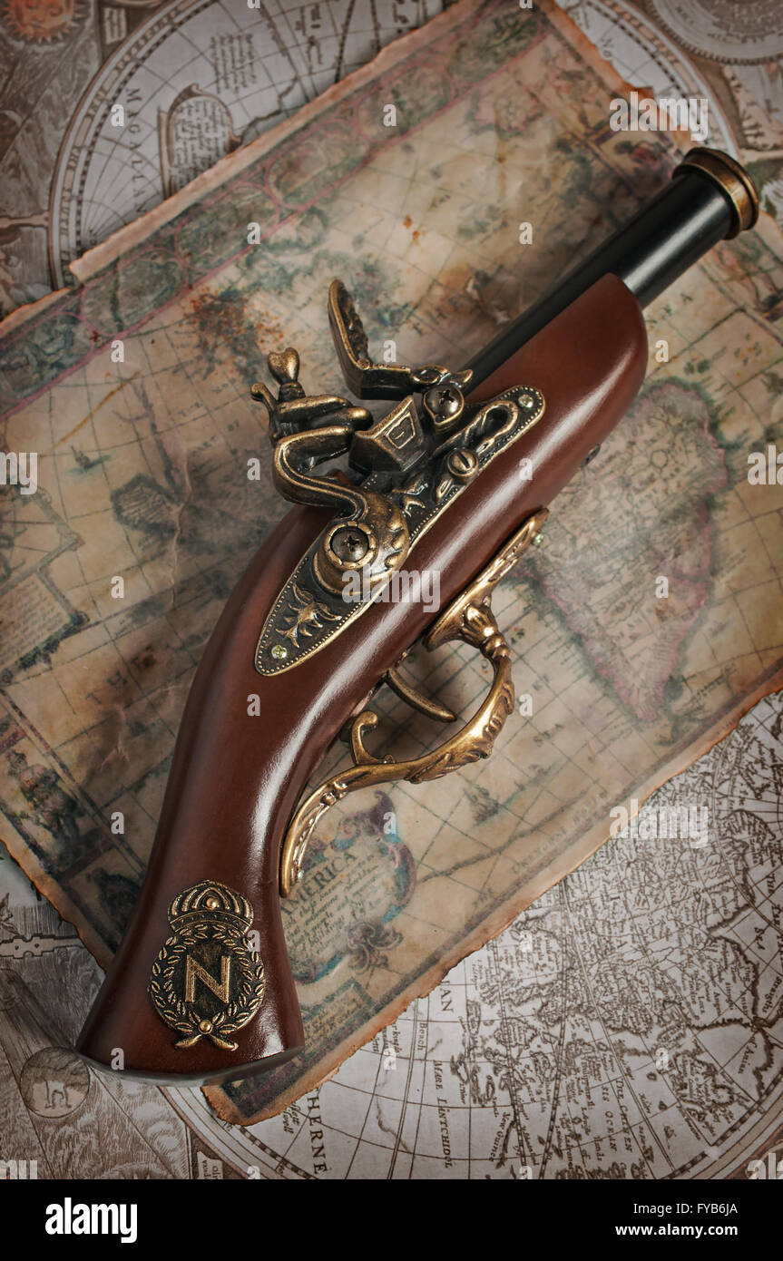 Antique musket on the background of an ancient map close-up Stock Photo ...