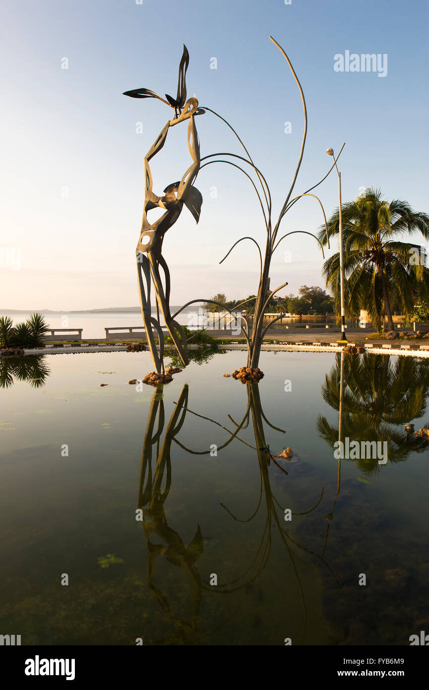 Modern statue reflecting in the water, Cienfuegos, Cuba, Unesco World ...