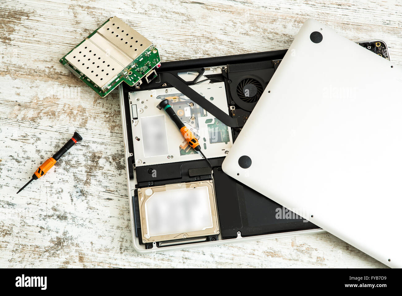 A open laptop getting repaired Stock Photo - Alamy