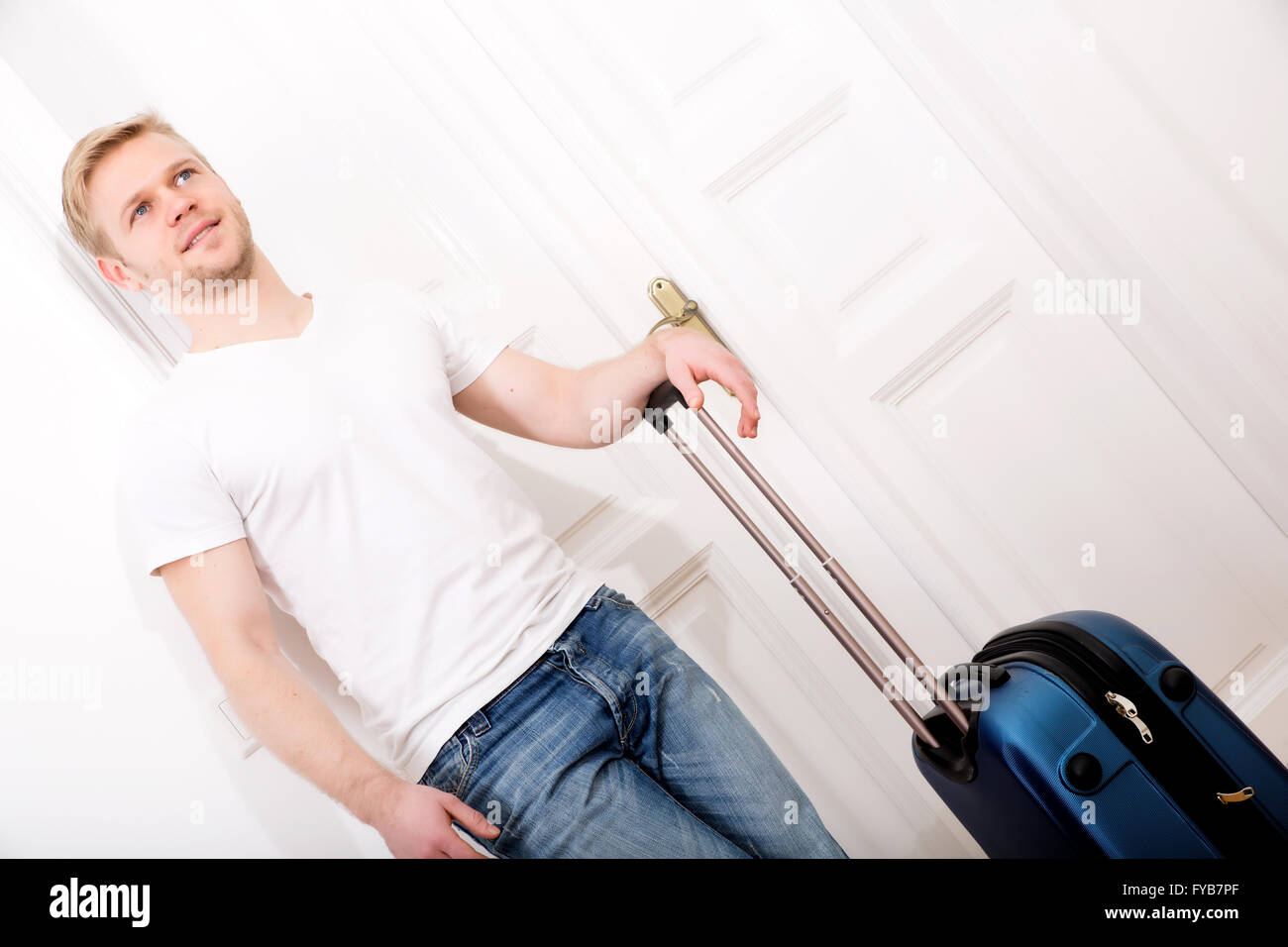 Man leave home suitcase hi-res stock photography and images - Alamy