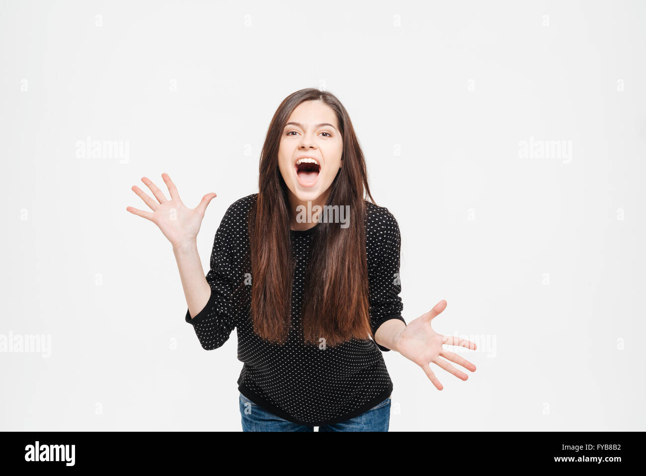 Young woman screaming isolated on a white background Stock Photo - Alamy