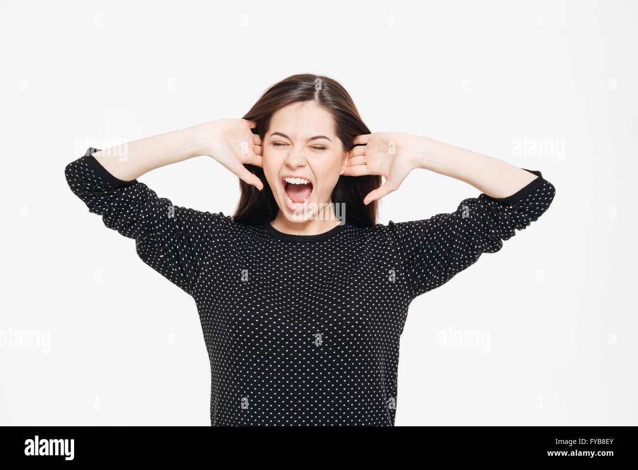 Beautiful woman screaming isolated on a white background Stock Photo ...