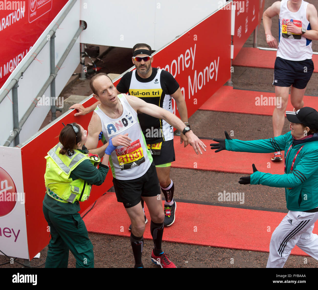 London,UK,24th April 2016,St John Ambulance staff help runners at the ...