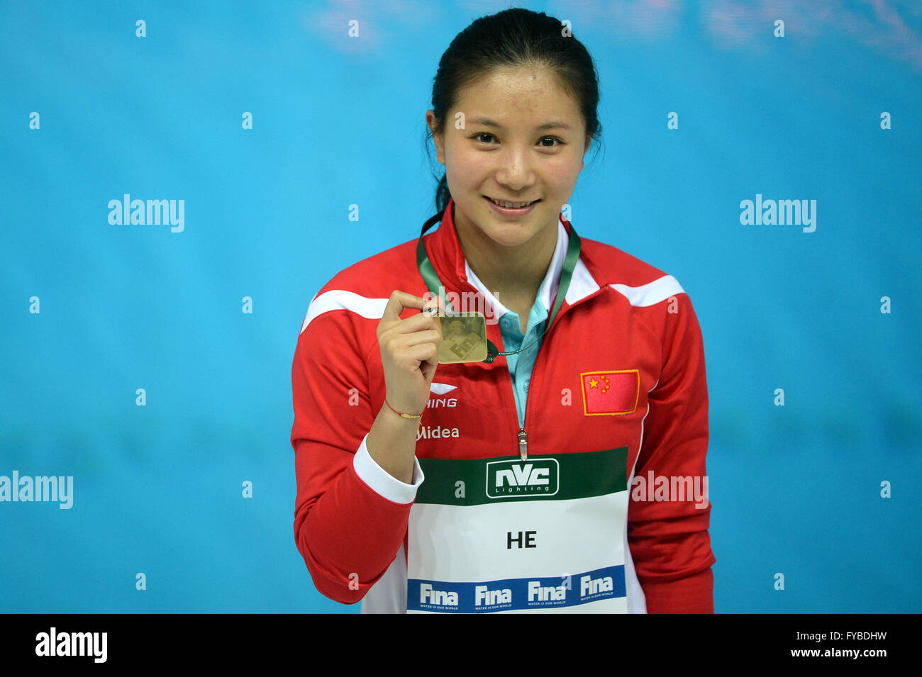 Kazan, Russia. 24th Apr, 2016. He Zi of China poses during the awarding ...