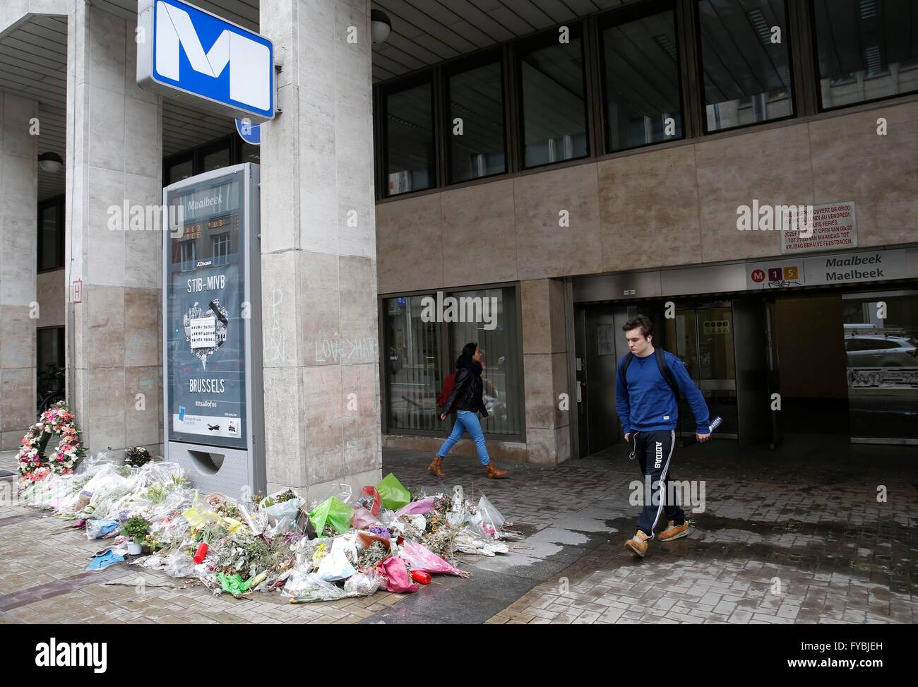 Brussels, Belgium. 25th Apr, 2016. Commuters walk past an entrance of ...