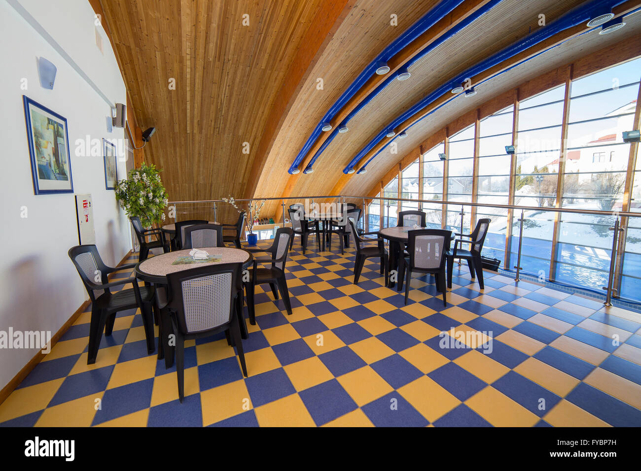 Cafe interior with swimming pool on background Stock Photo - Alamy