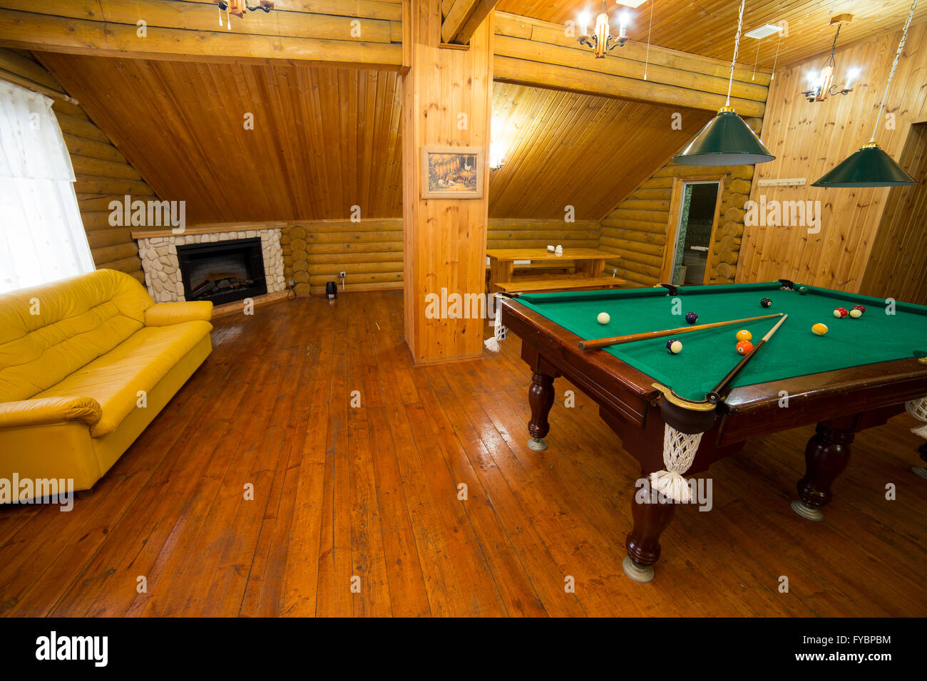Billiards room interiors in wooden house Stock Photo - Alamy