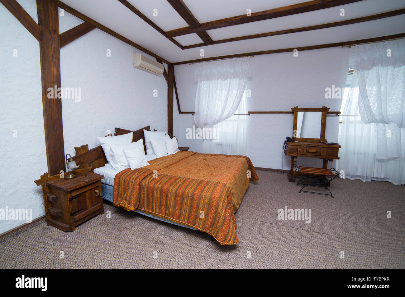 Hotel apartments interior in country style Stock Photo - Alamy