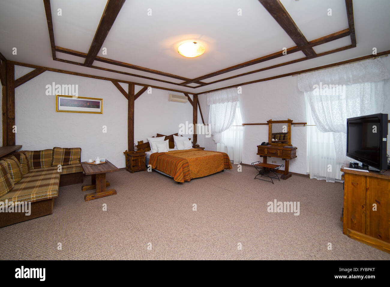 Hotel apartments interior in country style Stock Photo - Alamy