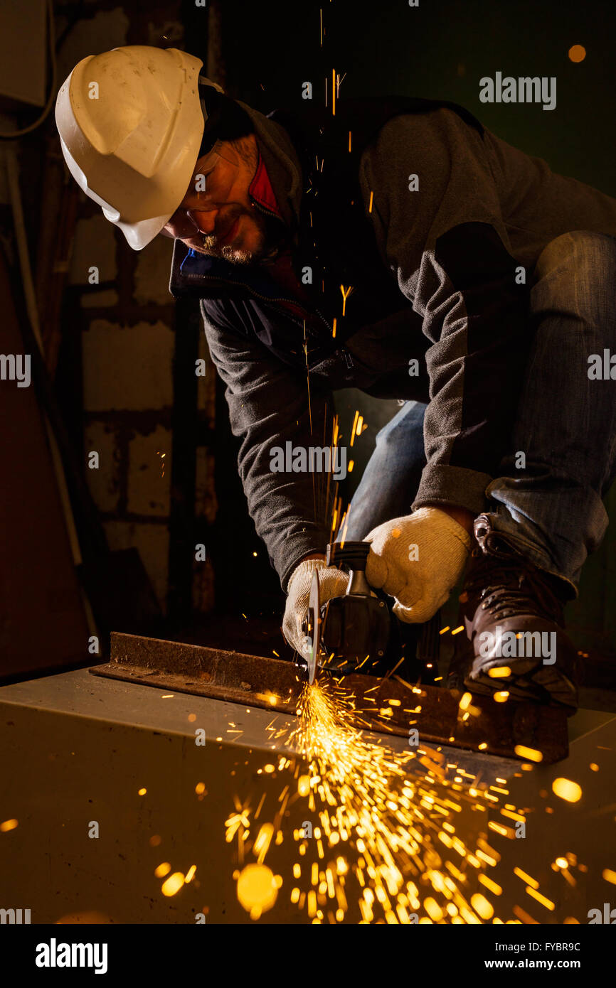 Industrial worker grinding metal lot hi-res stock photography and ...
