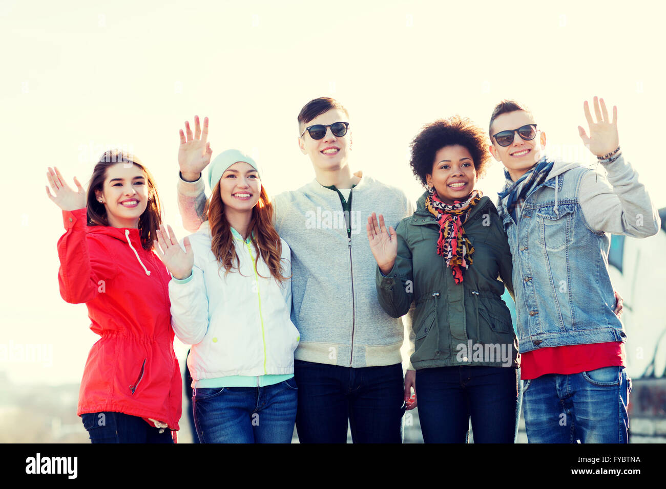 Teenager girl waving friend hi-res stock photography and images - Alamy
