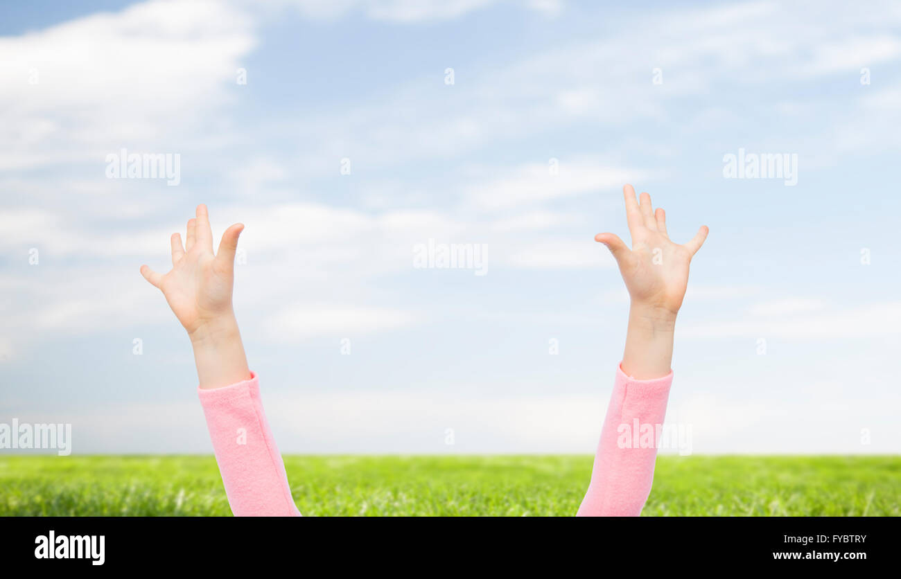 close up of little child hands raised upwards Stock Photo - Alamy