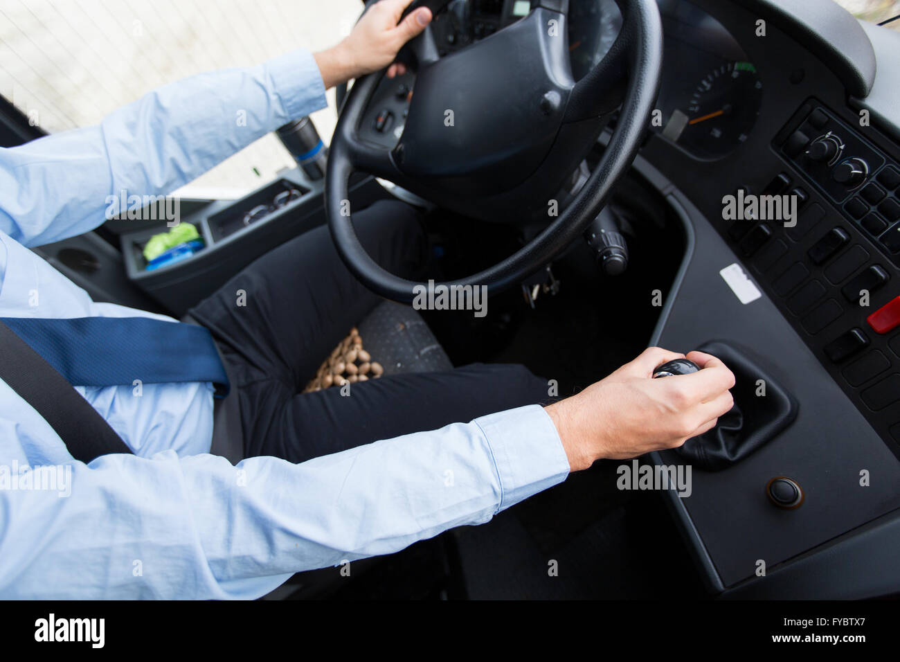 close up of driver driving passenger bus Stock Photo - Alamy