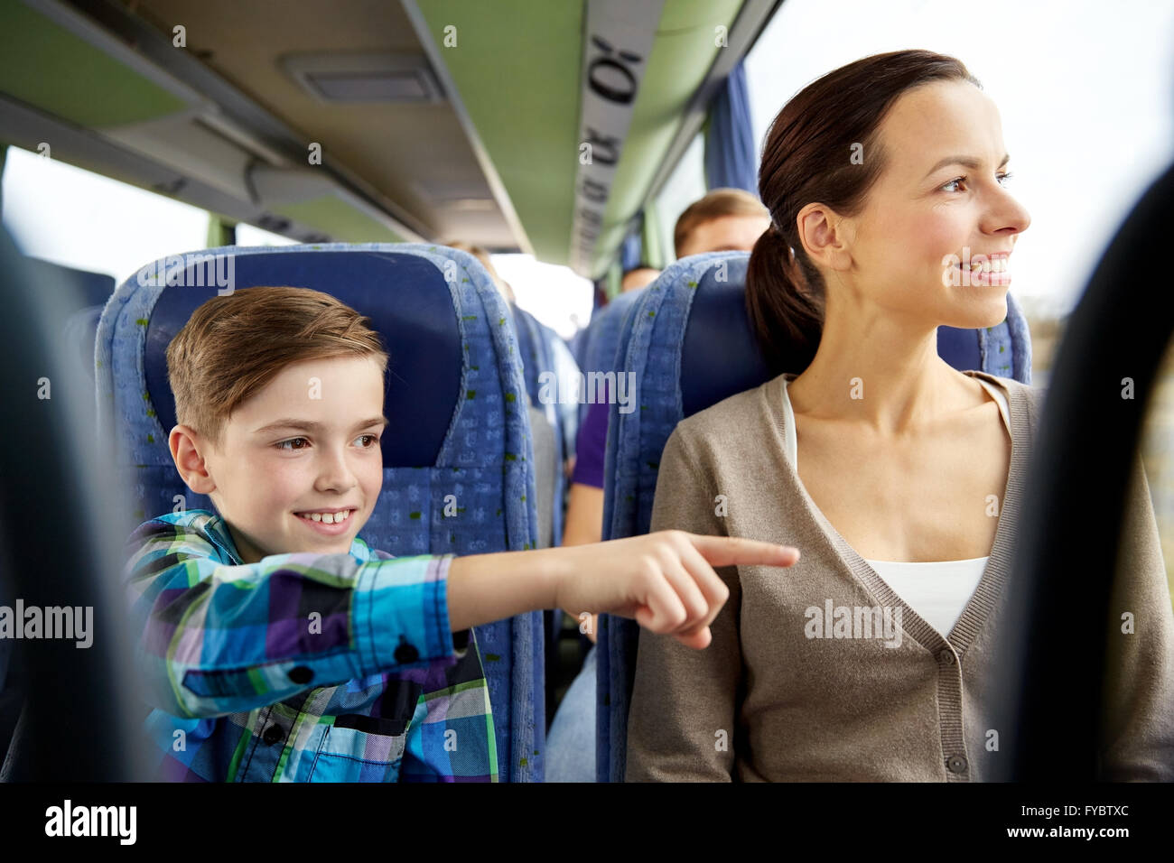 happy family riding in travel bus Stock Photo - Alamy