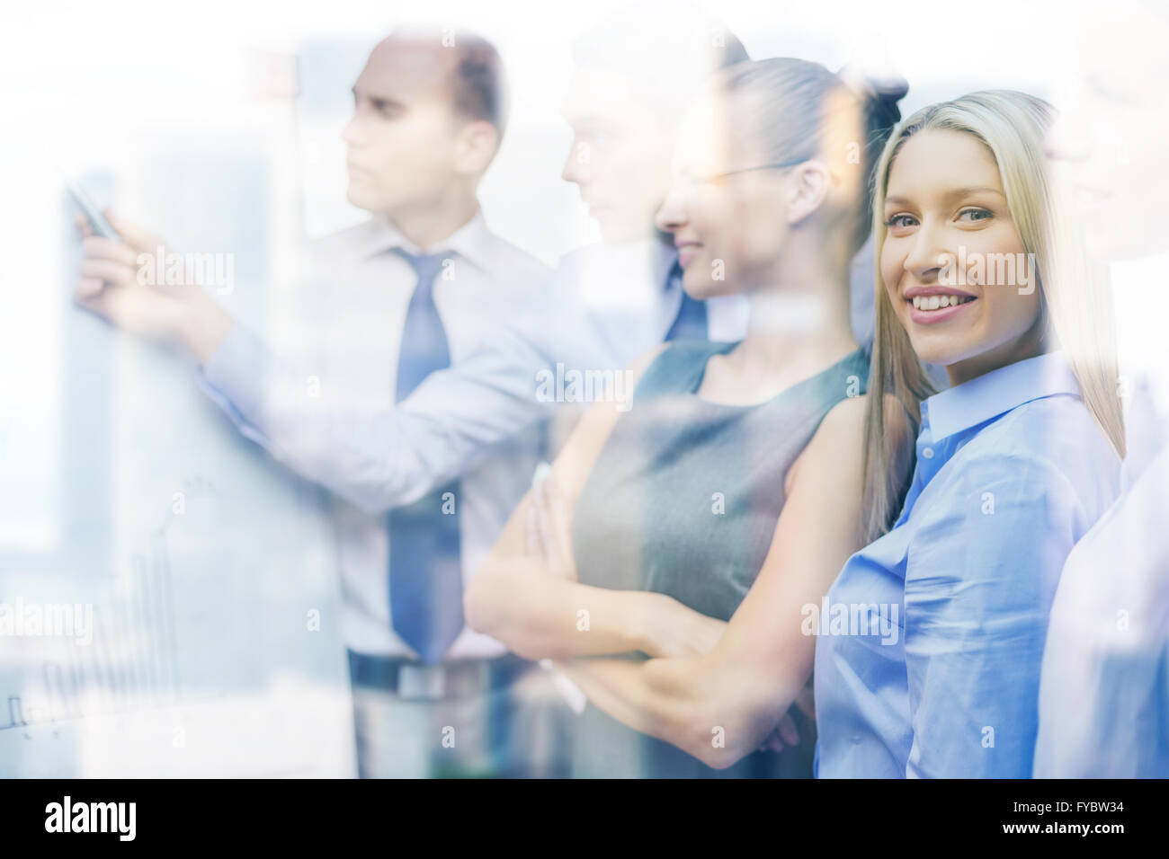 business team with flip board having discussion Stock Photo - Alamy