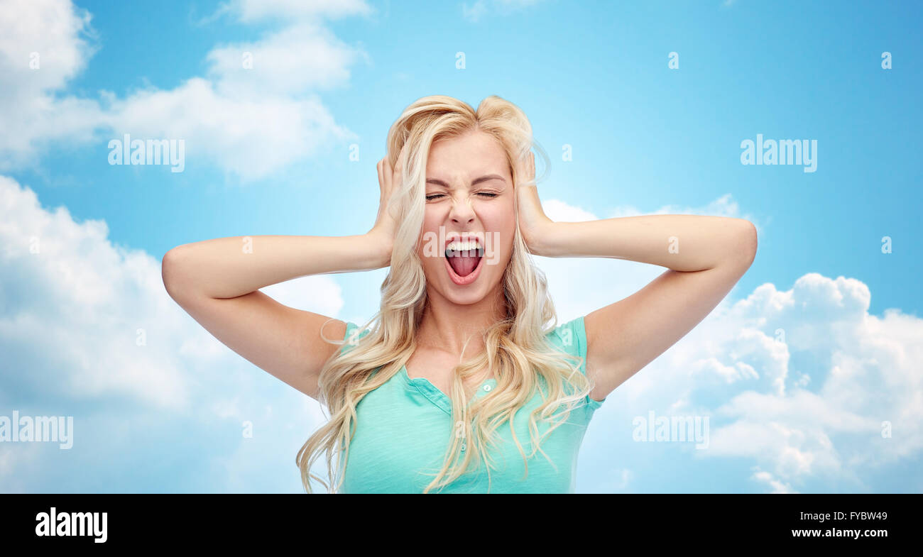 Screaming blonde woman hi-res stock photography and images - Alamy