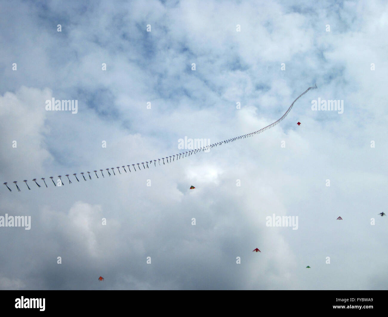 flying a dragon kite Stock Photo - Alamy