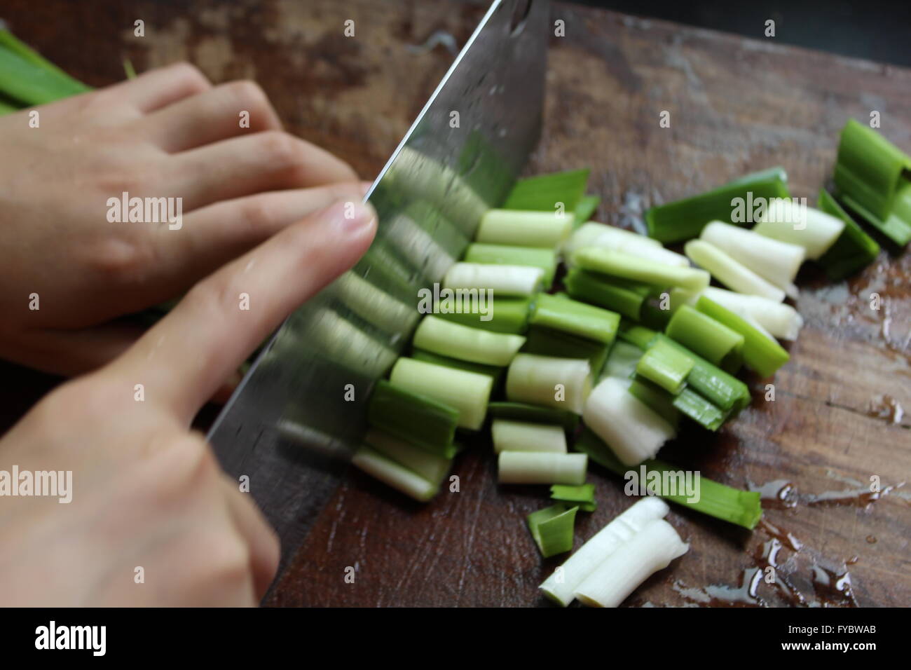 Cut the garlic bolt Stock Photo - Alamy