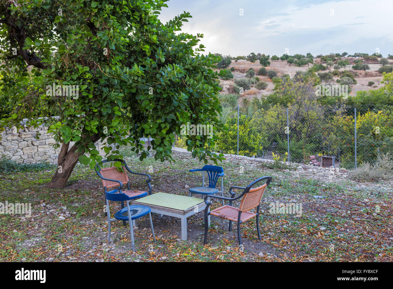 Table and chairs in the garden, Lefkara, Cyprus Stock Photo - Alamy