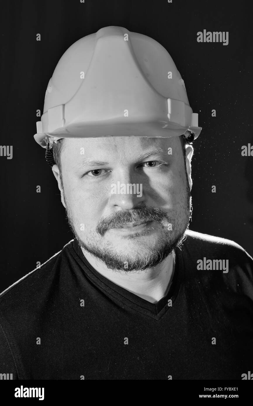 Male worker in hardhat Black and White Stock Photos & Images - Alamy
