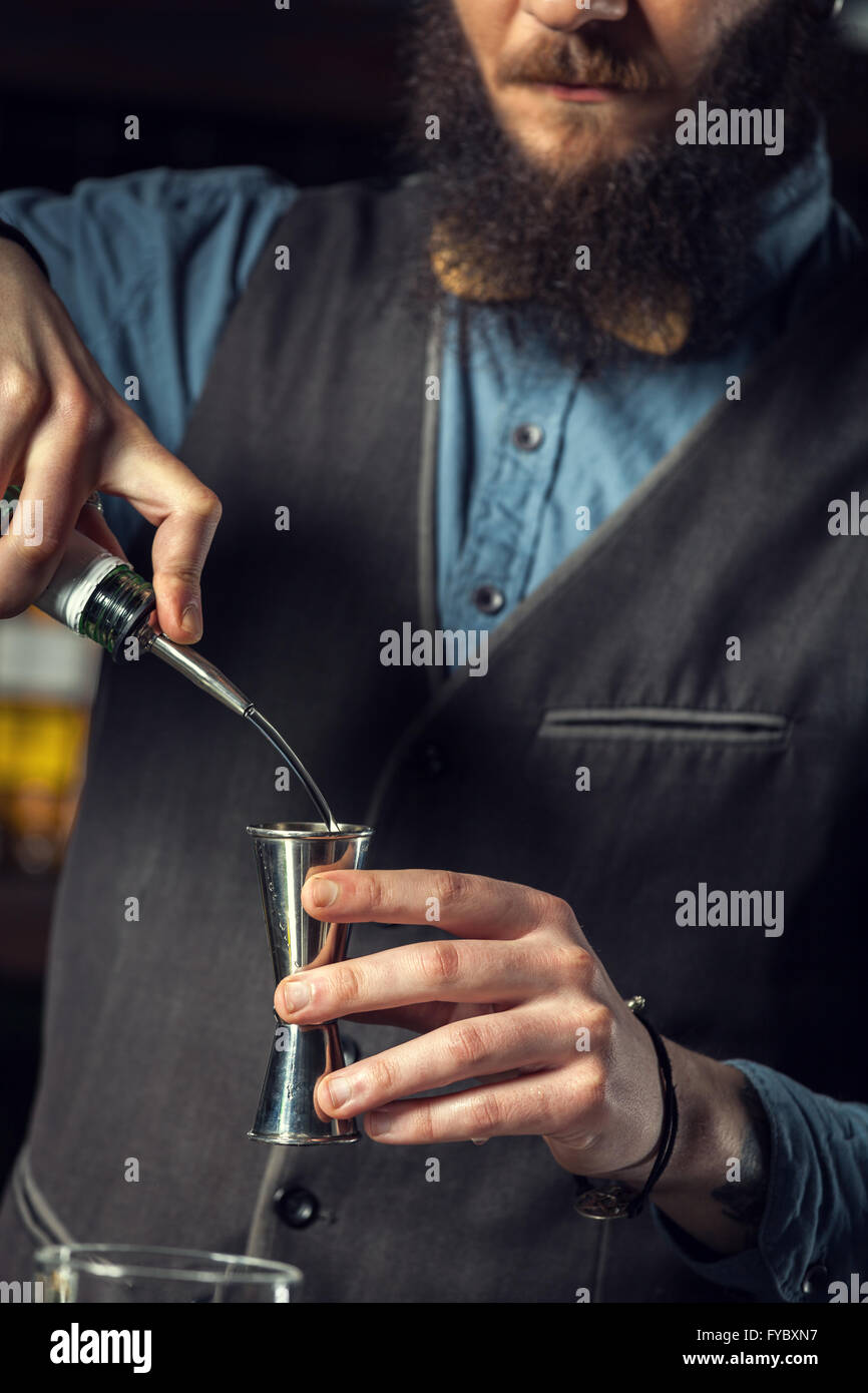 Bartender pouring alcohol jigger in hi-res stock photography and images ...