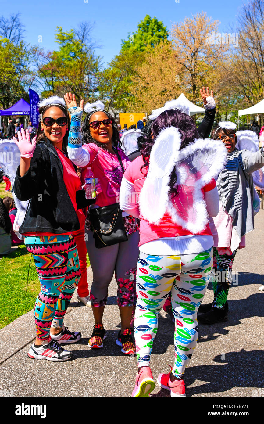 African-American women taking part in the Sista Strut cancer walk at ...