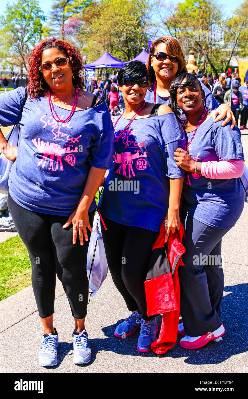 African-American women taking part in the Sista Strut cancer walk at ...