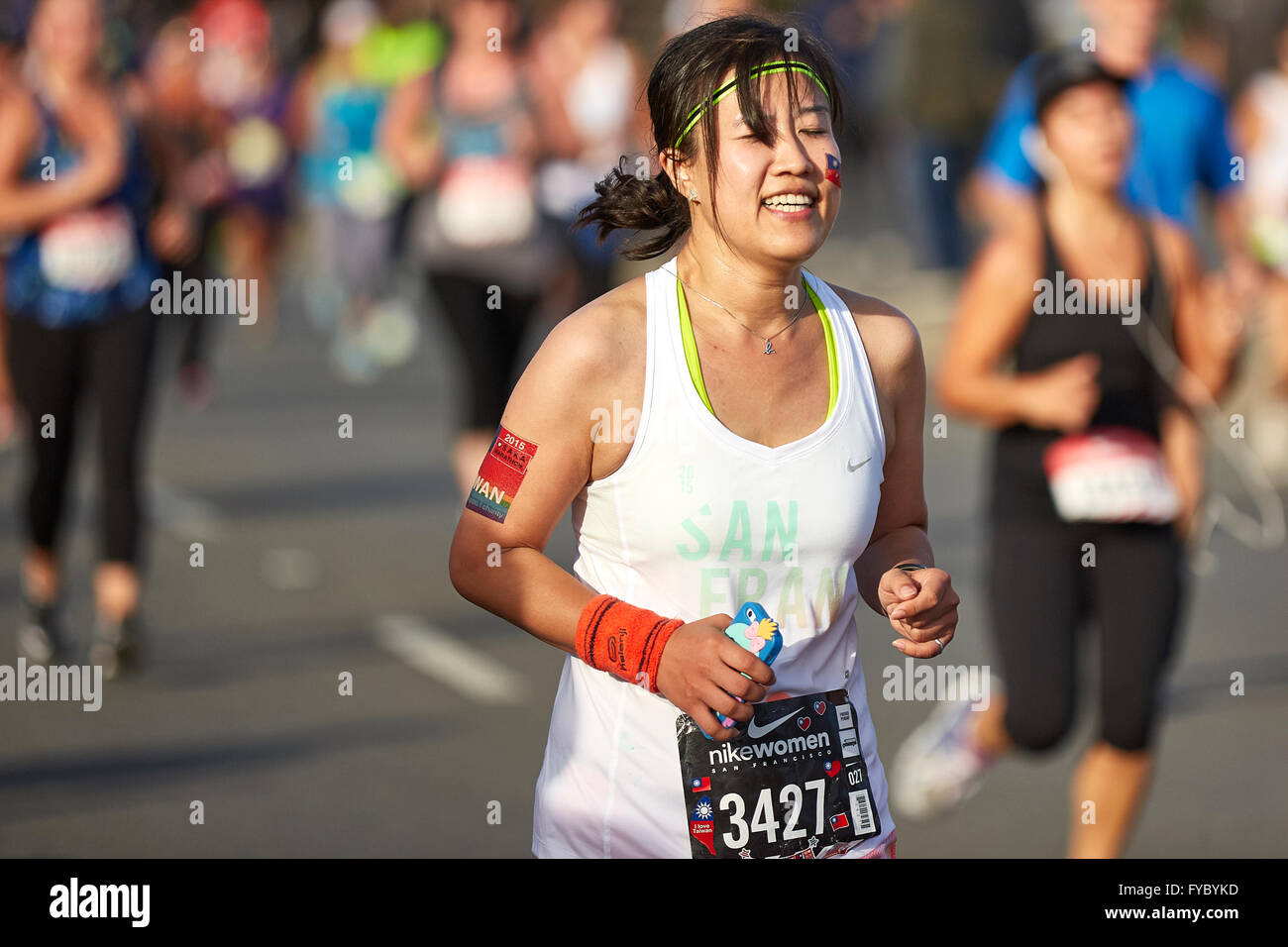 Committed Asian Female Athlete Running In The Nike Woman's Half ...