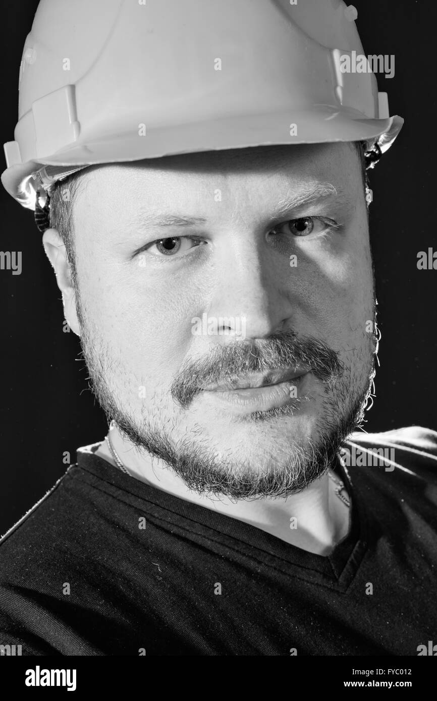 Male worker in hardhat Black and White Stock Photos & Images - Alamy