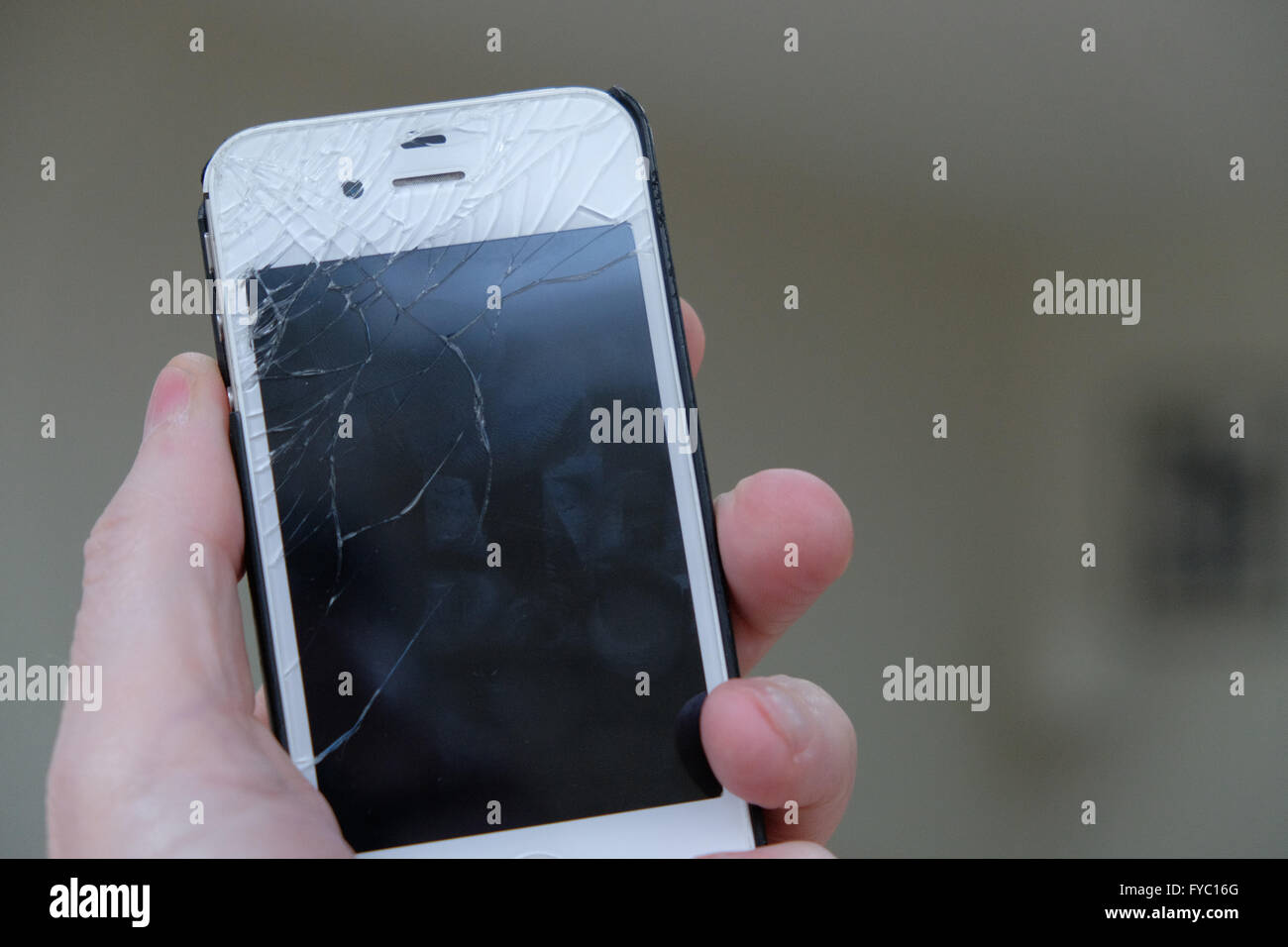 Iphone glass broken hand hi-res stock photography and images - Alamy