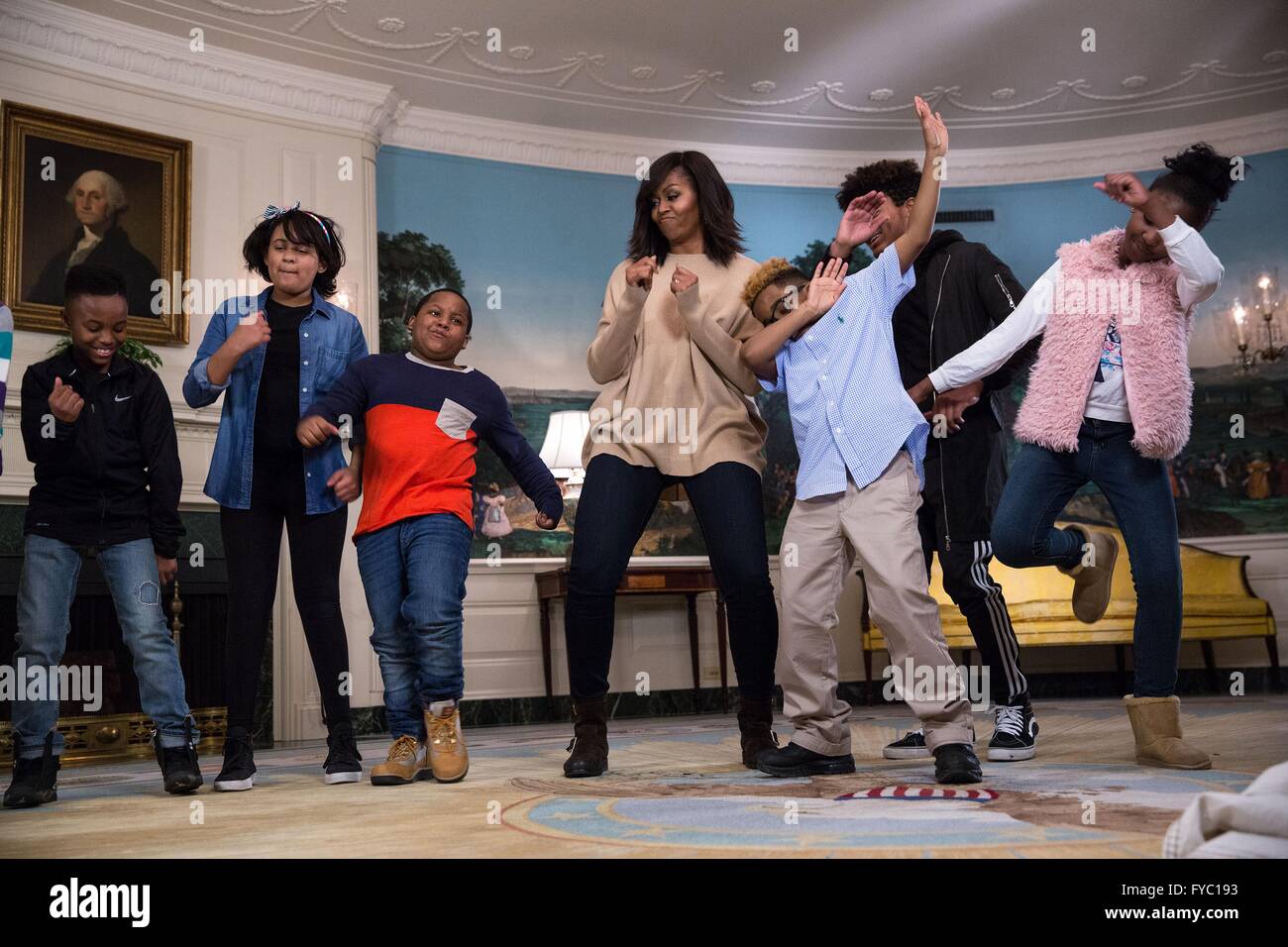 U.S First Lady Michelle Obama dances with students as she participates ...