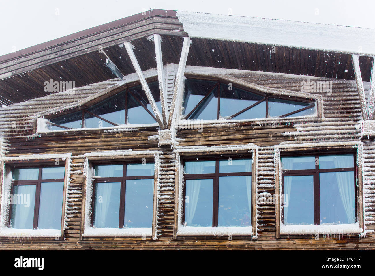 Wooden facade with windows at hoarfrost snowy weather Stock Photo - Alamy