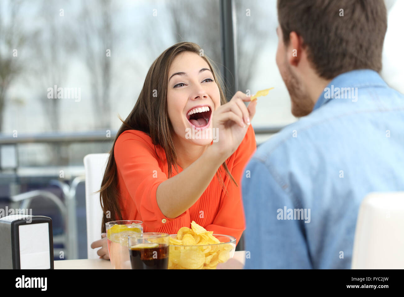 Man eating potato chips hi-res stock photography and images - Alamy