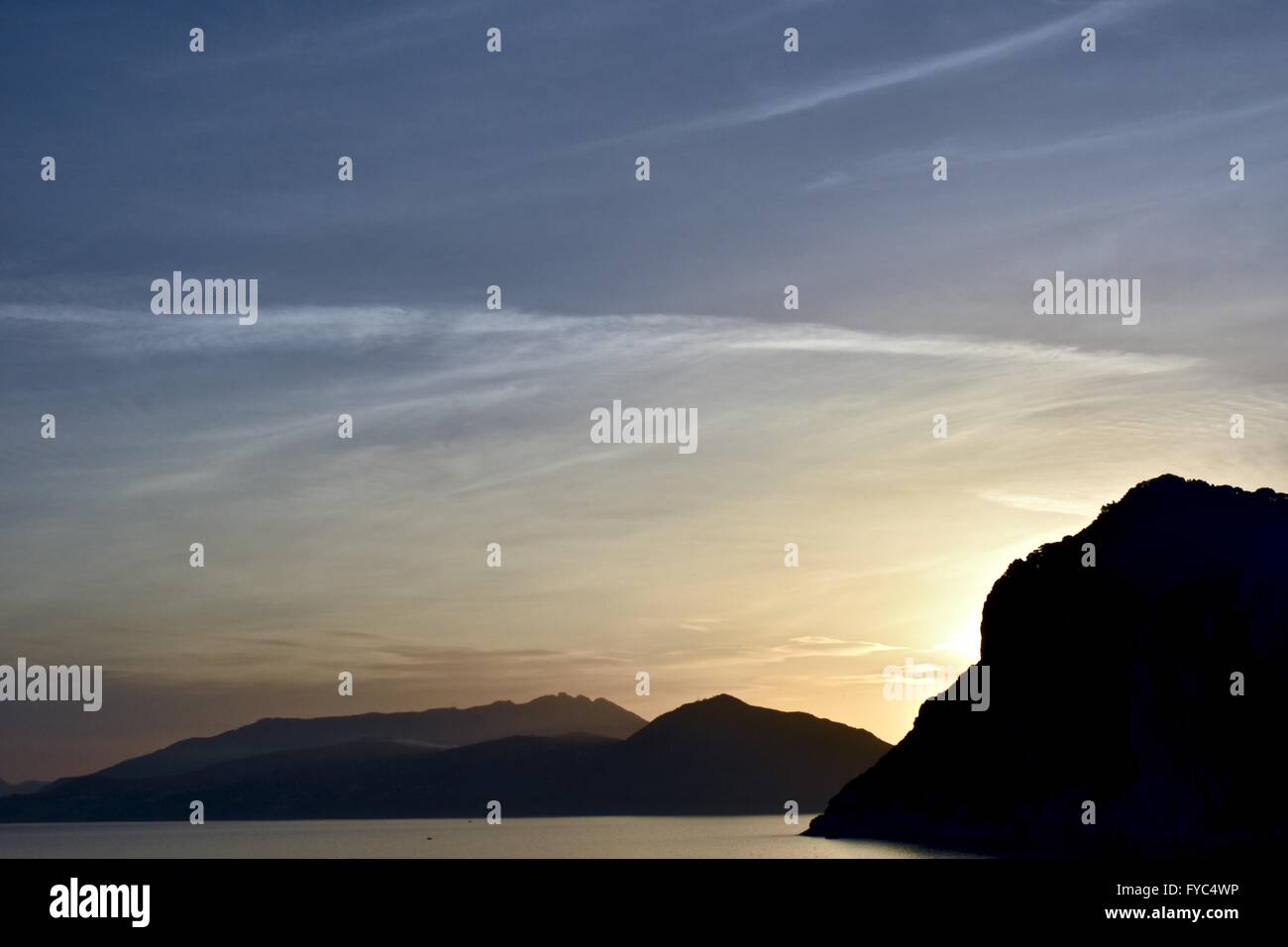 Sunset over the harbor on Capri island, Italy Stock Photo - Alamy