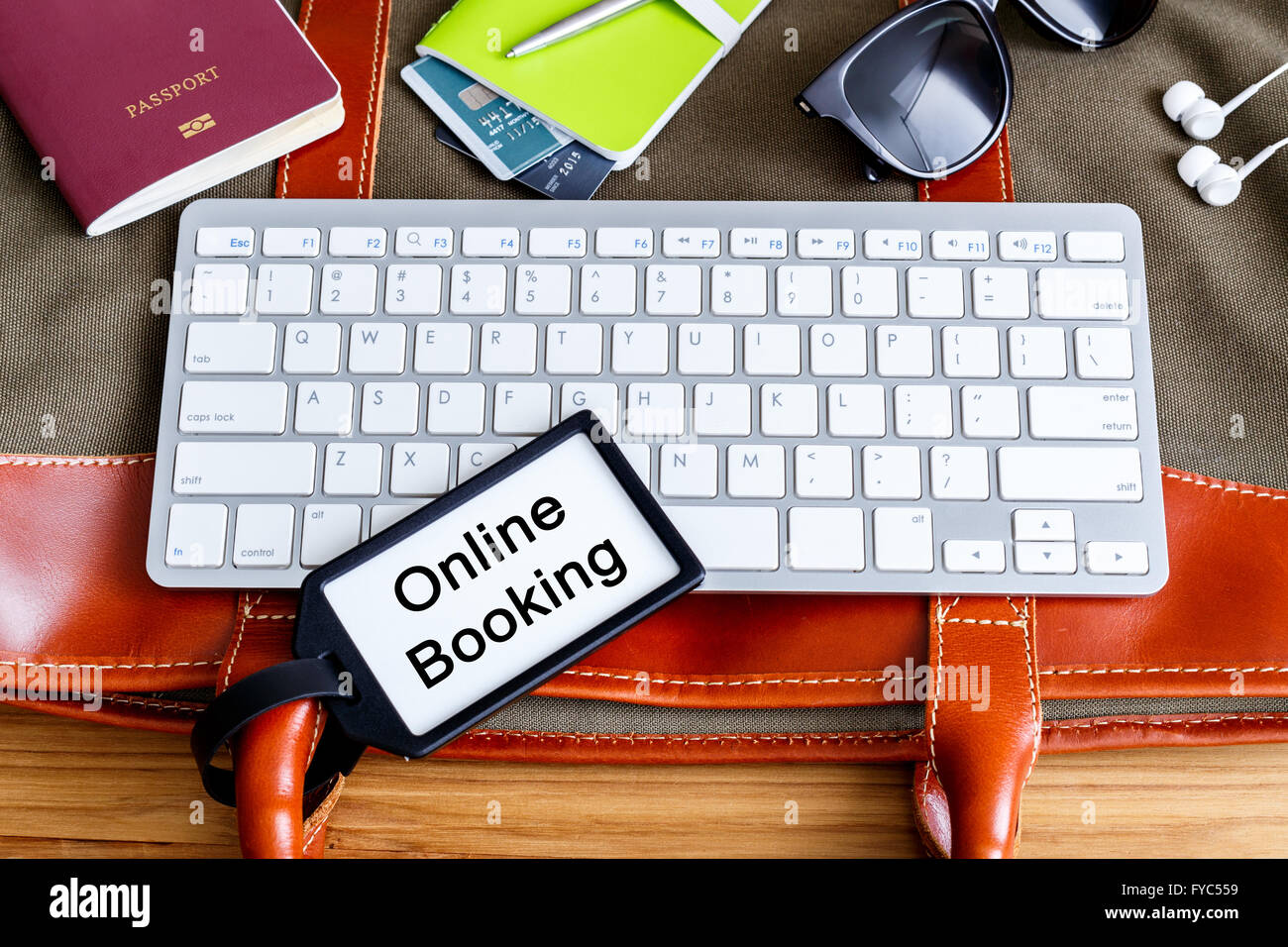 Online travel booking and planning concept with bag tag and traveling ...