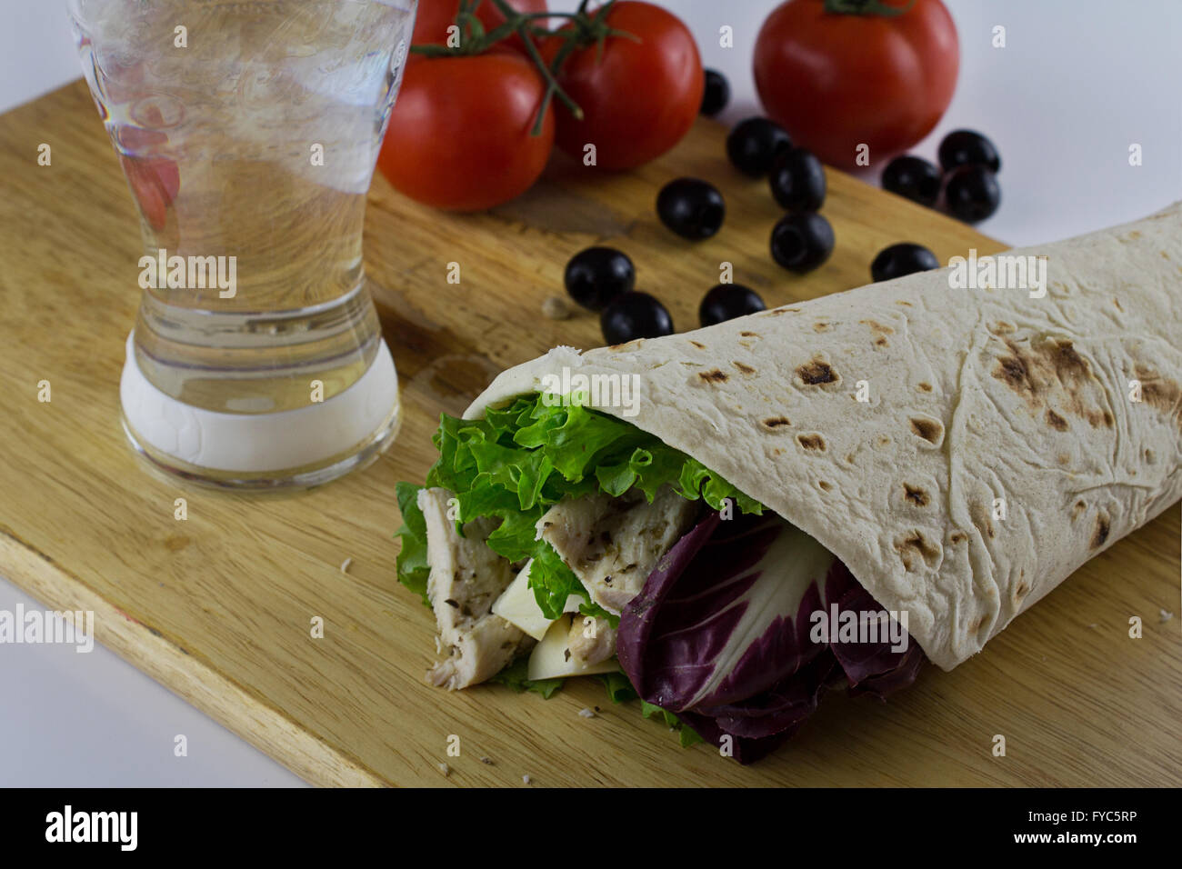 Italian typical piadina wrap with chicken and salad, as healthy lunch ...