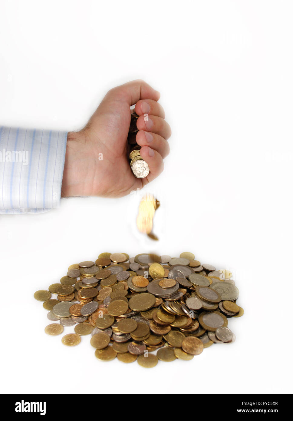 Gold coins falling hand Cut Out Stock Images & Pictures - Alamy