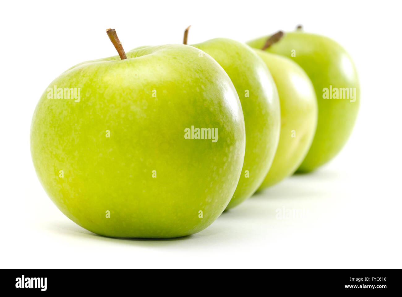 apples in row isolated on white Stock Photo - Alamy