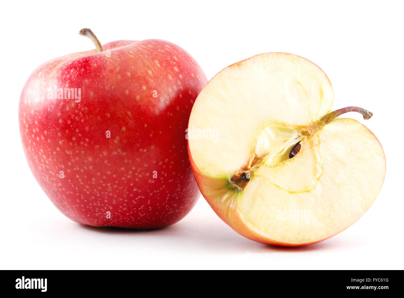 red apple and its half isolated on white Stock Photo - Alamy